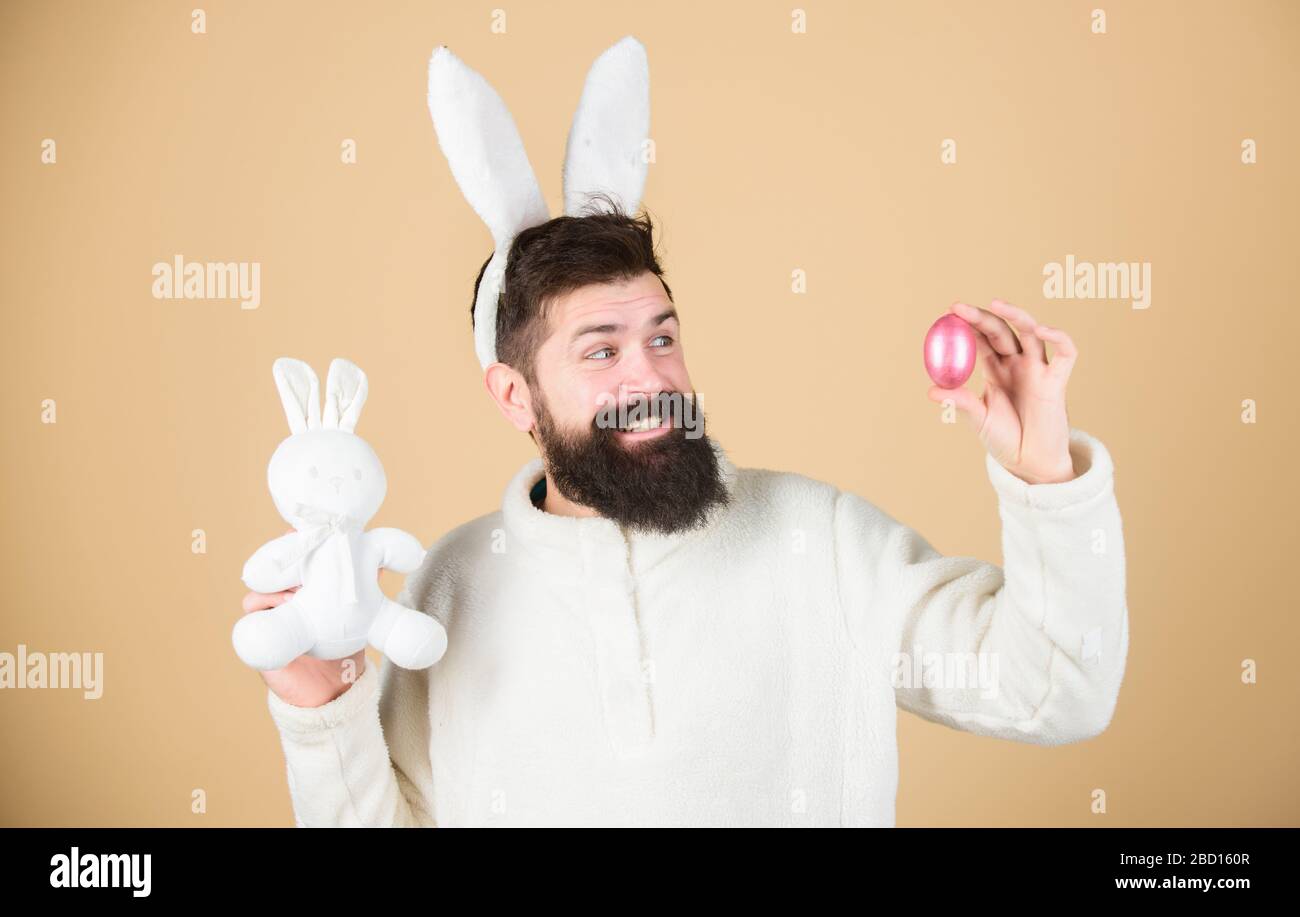 Weirdo concept. Celebrate Easter. Guy bearded hipster weird bunny with ...