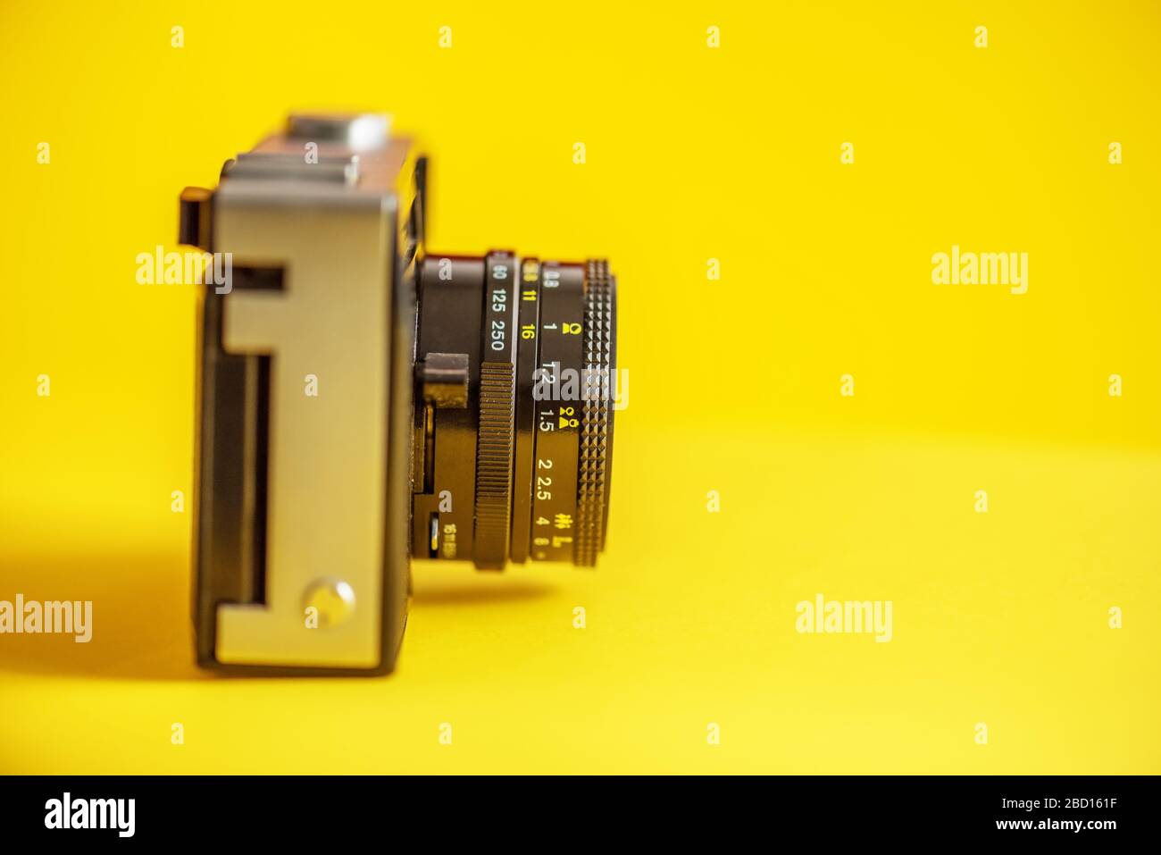 Very Old Vintage Film Camera, Studio Shot in yellow background Stock ...