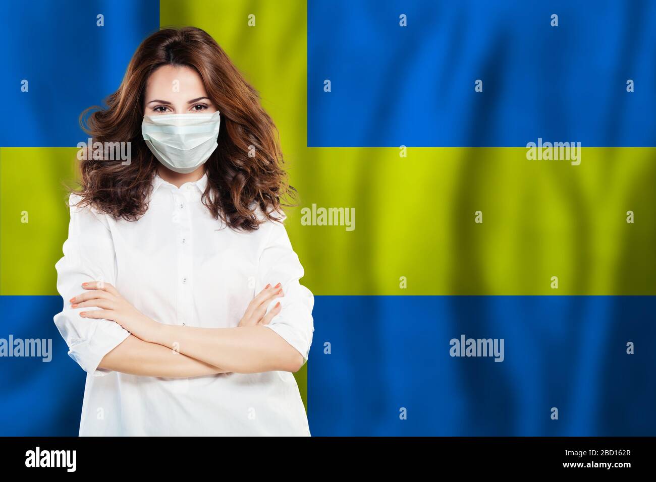 Happy Swedish doctor or nurse in medical safety face mask on Sweden ...