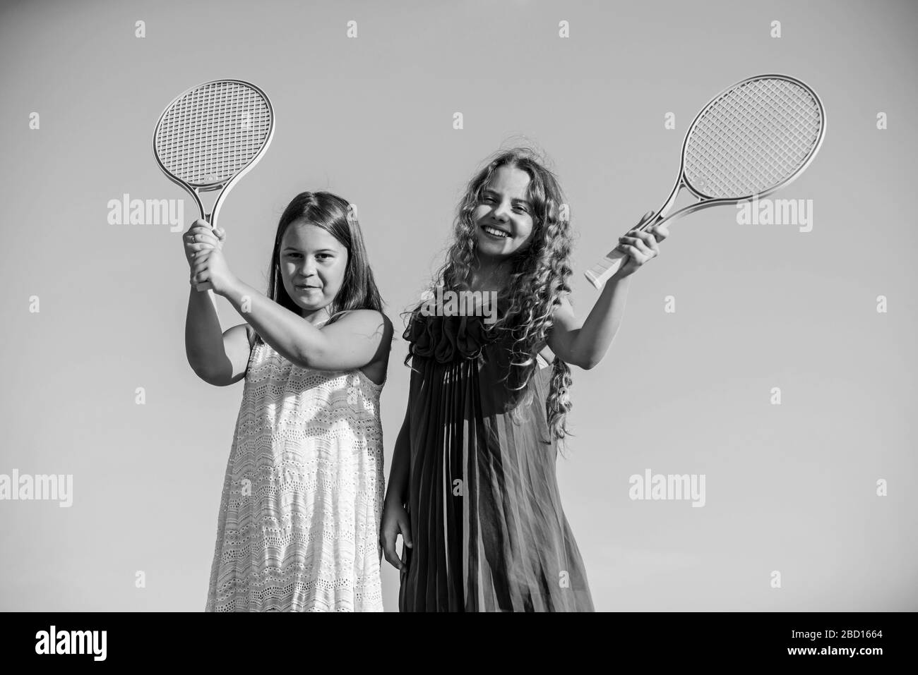 Girls Playing Tennis Black and White Stock Photos & Images - Alamy
