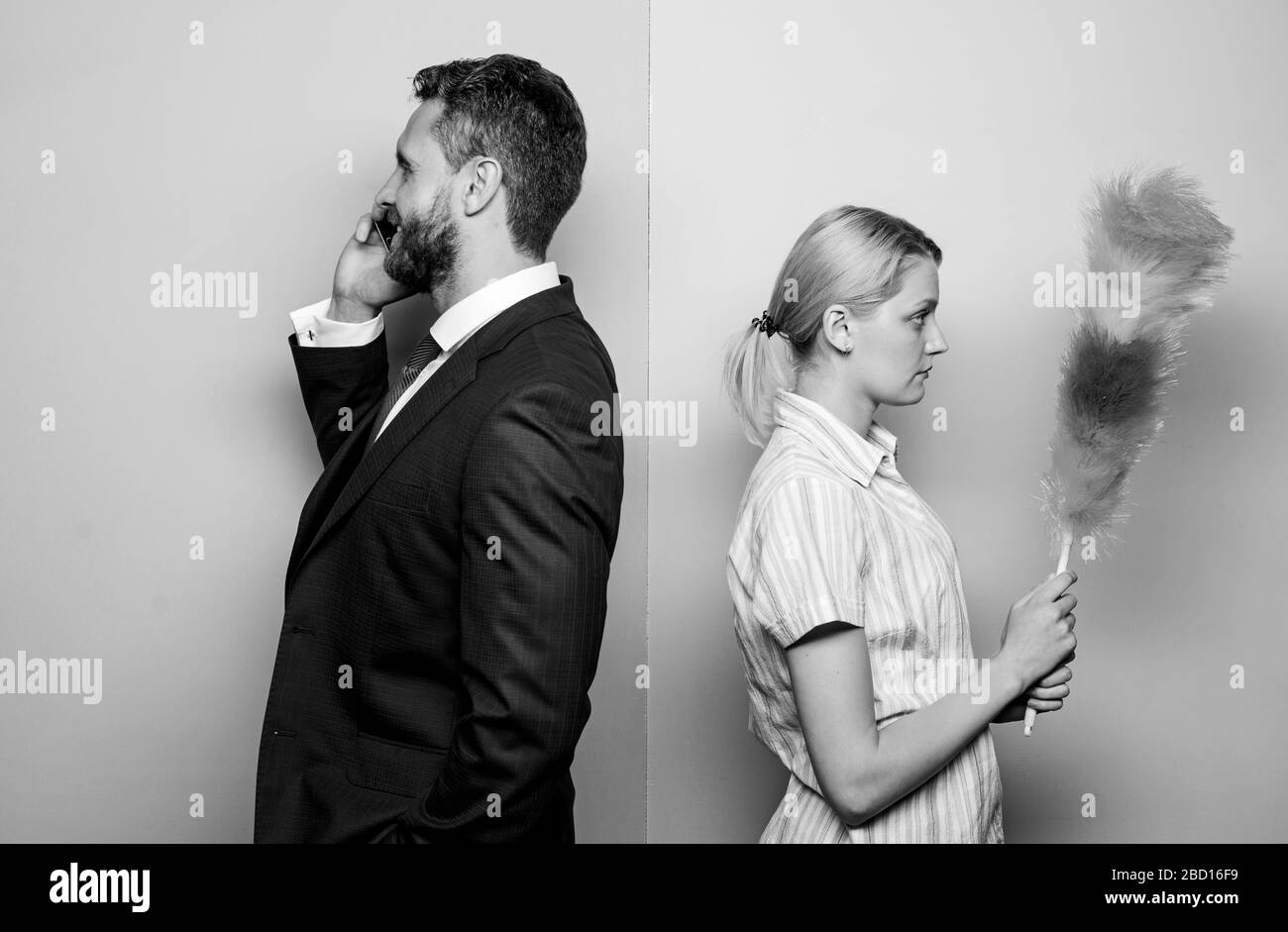 segregation of duties. man speak phone. woman clean house. housekeeping ...