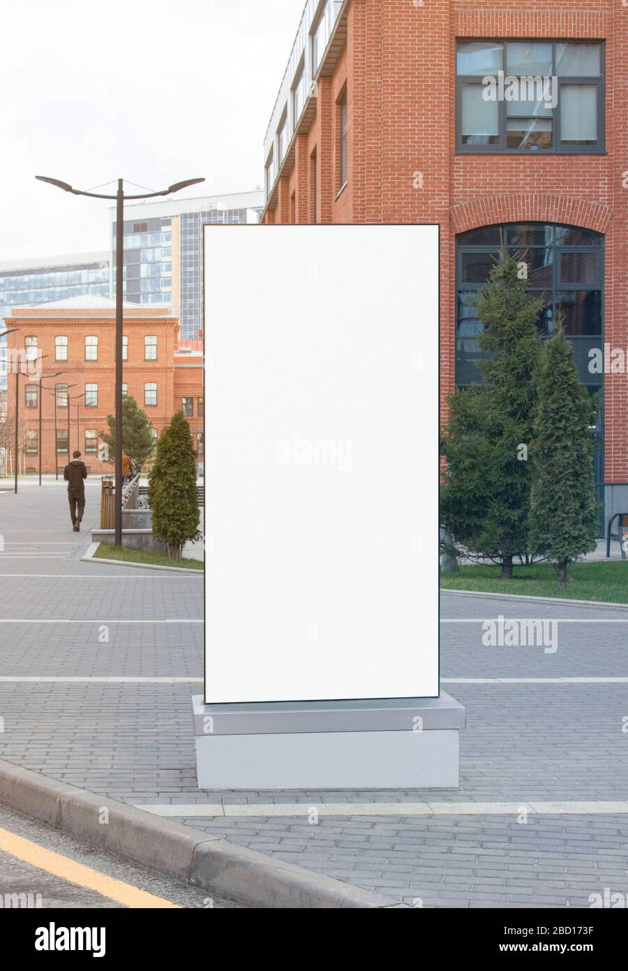 Blank white vertical pylon stand mock up brick building background ...