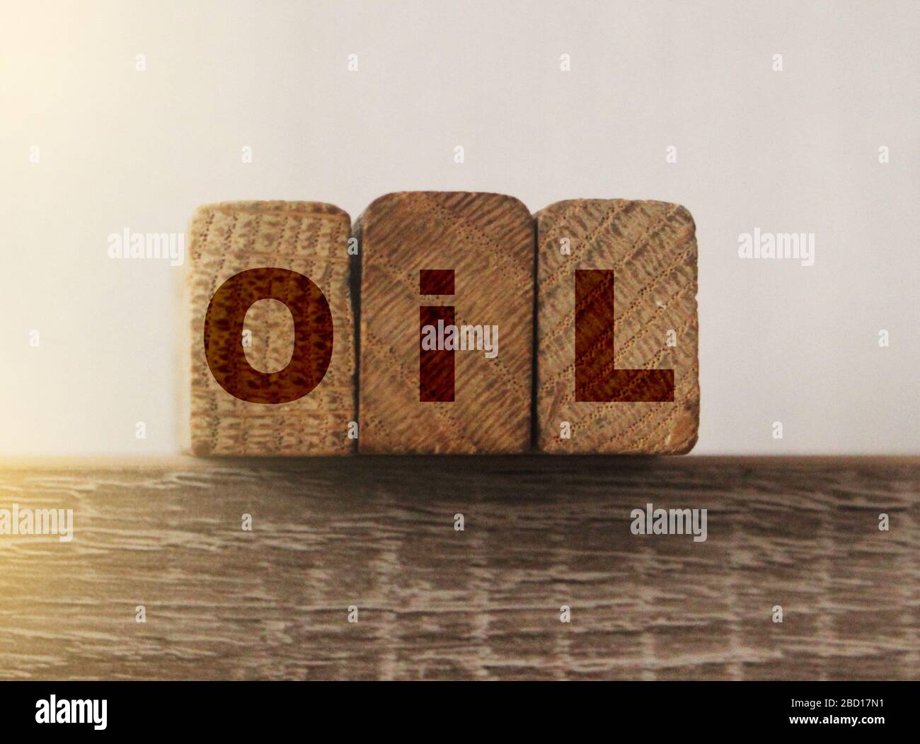 Oil word letters in wooden cubes. Falling or rising oil prices world ...