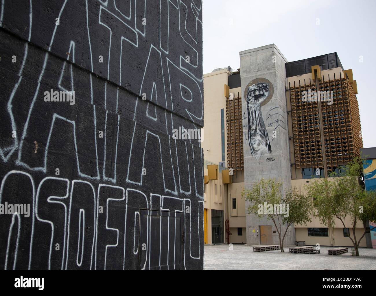 A View of part of the buildings with artwork on them that make up The ...