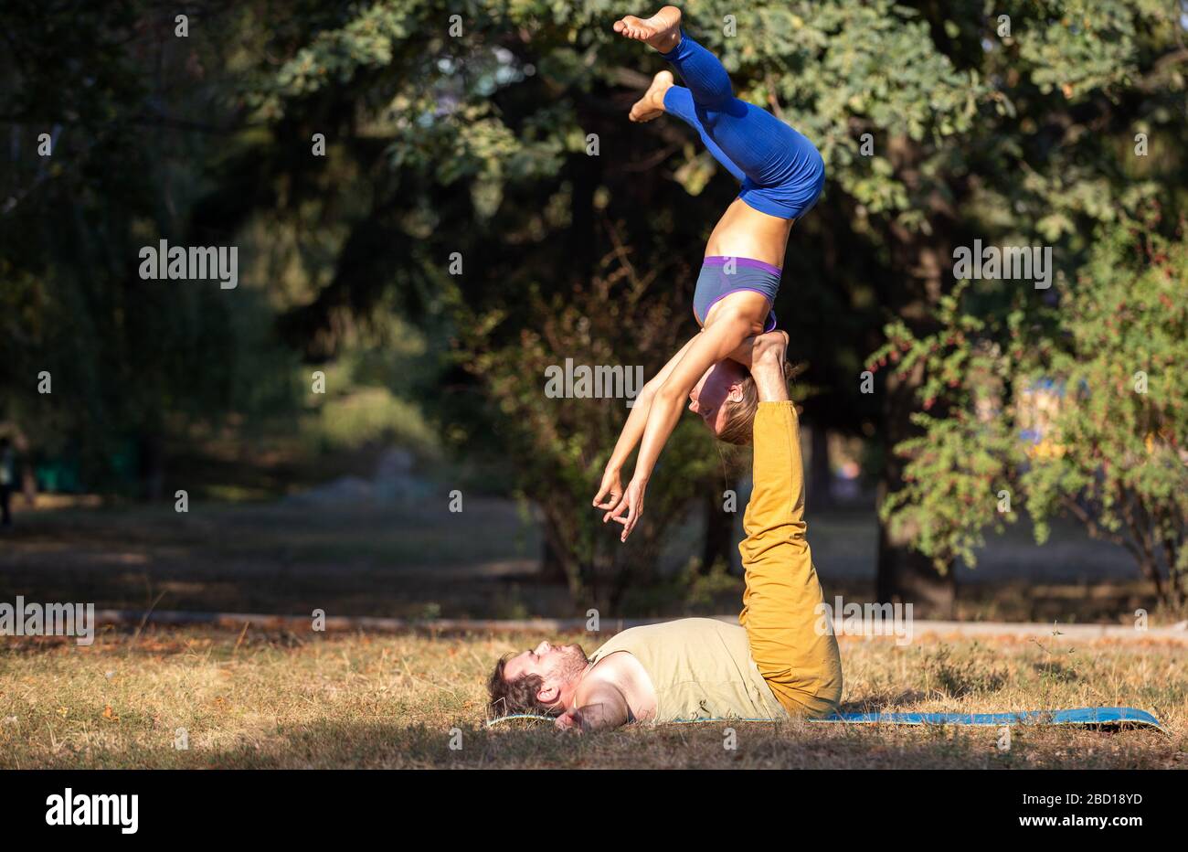 Shoulder stand pose High Resolution Stock Photography and Images - Alamy