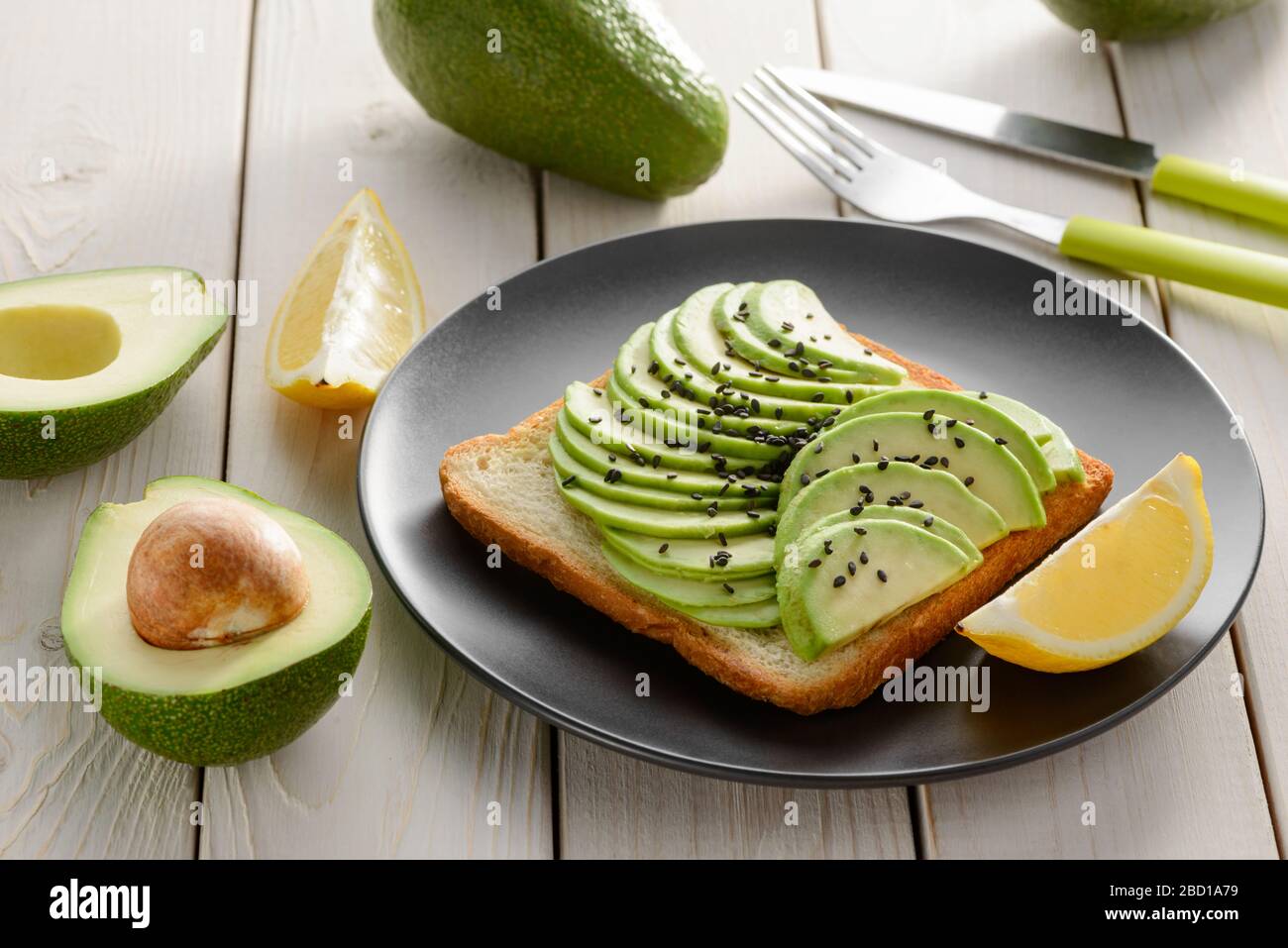 Toast with avocado slices. Healthy snacks for breakfast Stock Photo - Alamy