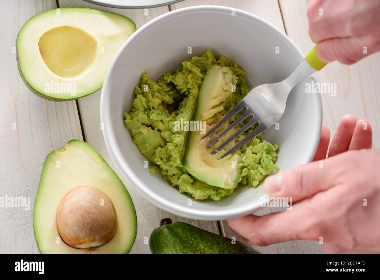 Mashing avocado hi-res stock photography and images - Alamy