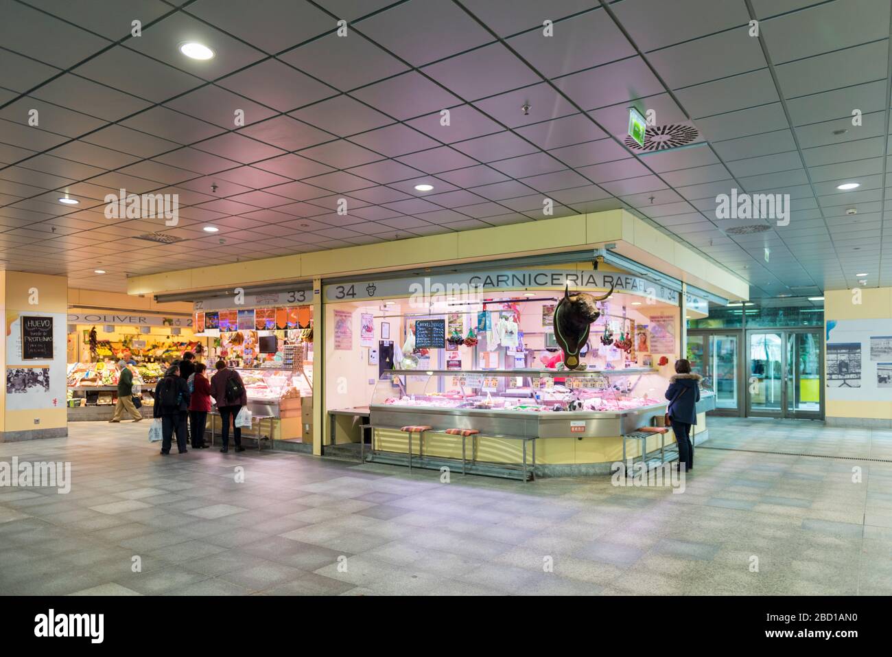 A butchers market stall in the Triana covered market in Seville Spain ...