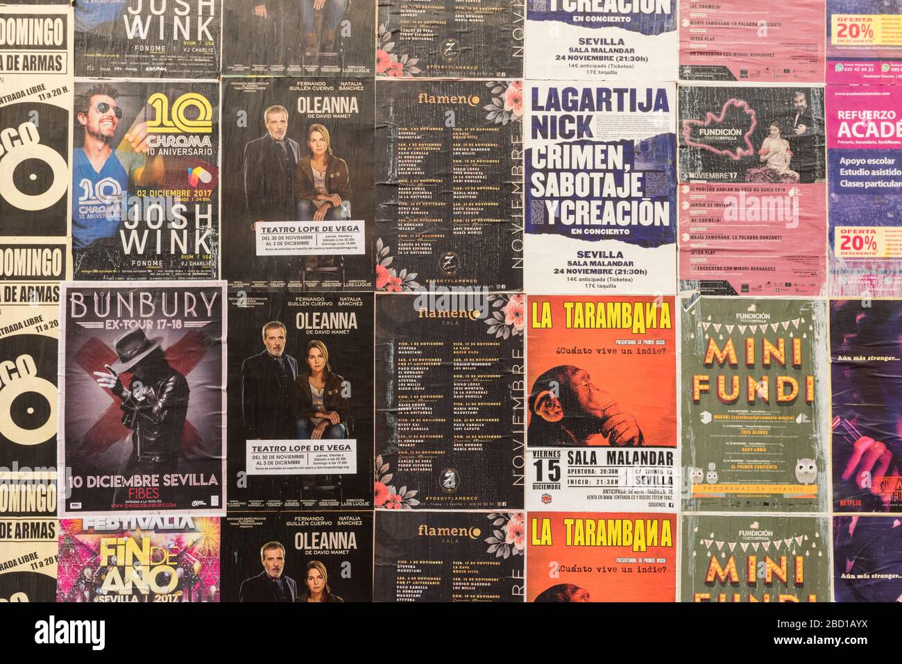 Old music event and concert posters stuck on a wall in Seville Spain ...