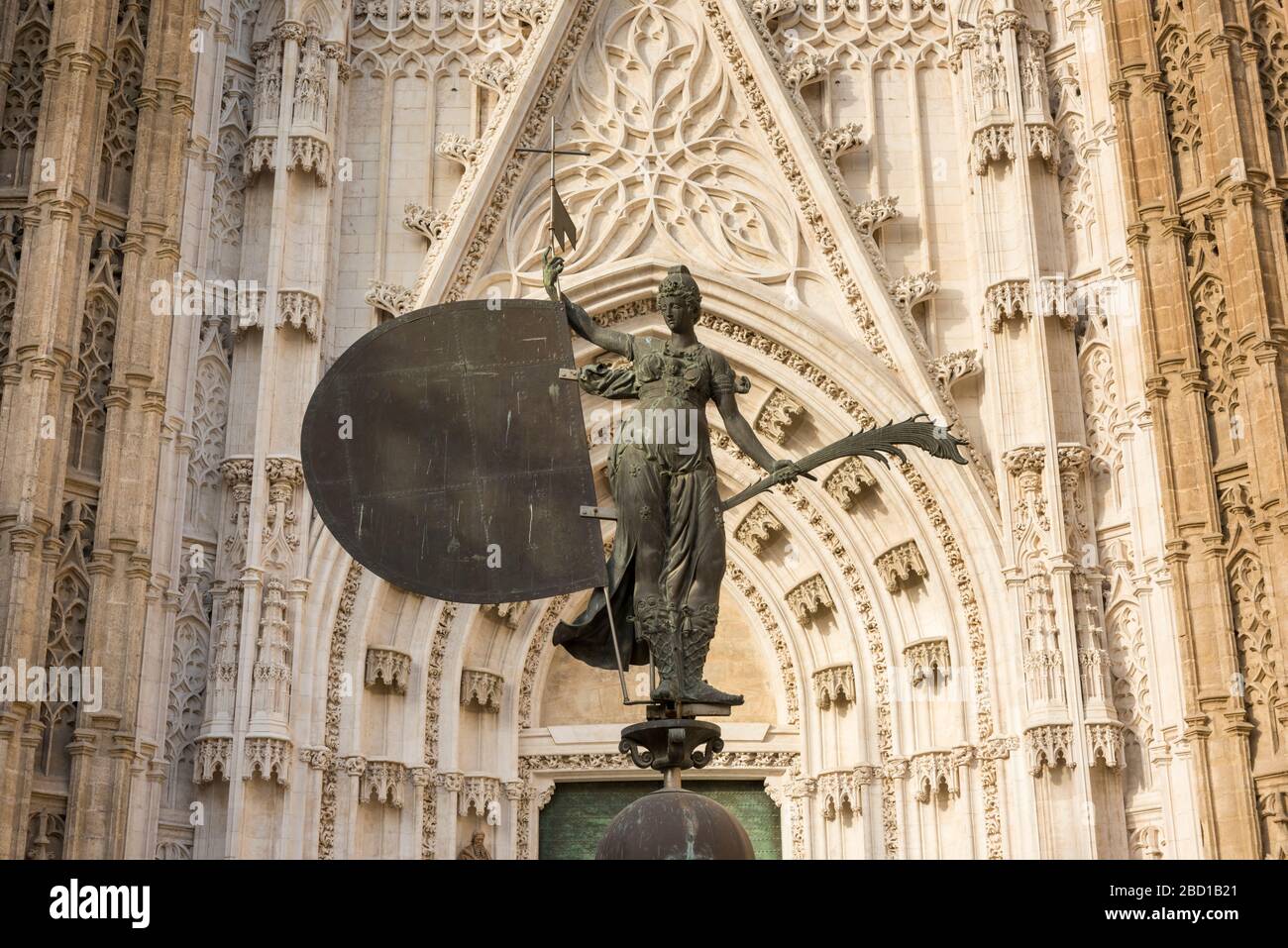 A bronze statue outside the Seville cathedral in Seville Spain Stock ...