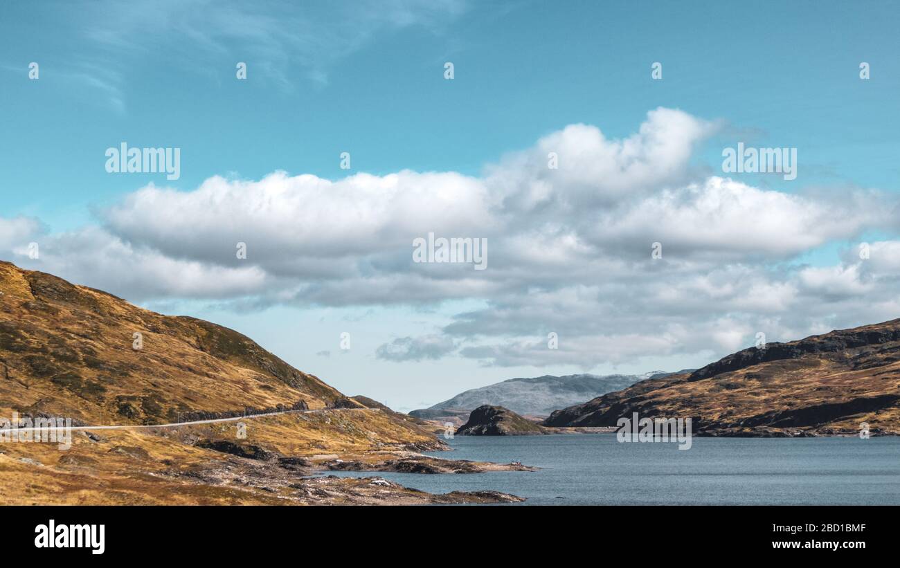 Norway high mountains lake on sunny day color graded landscape. Wild ...