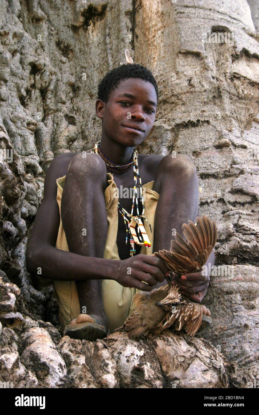 Africa, Tanzania, Lake Eyasi, young male Hadza child. Hadza, or Hadzabe ...