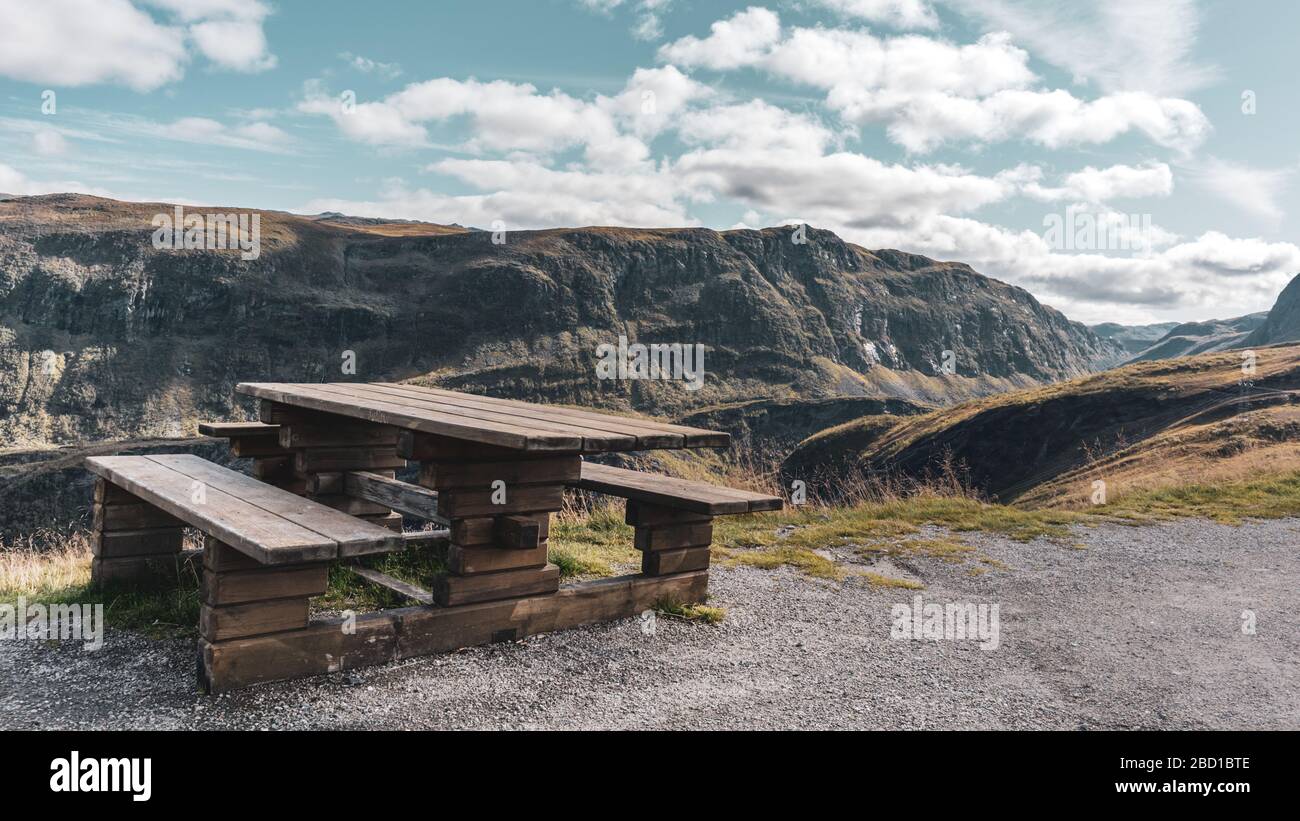 Wooden bench, norwegian mountains rest viewpoint. Travel scandinavian ...
