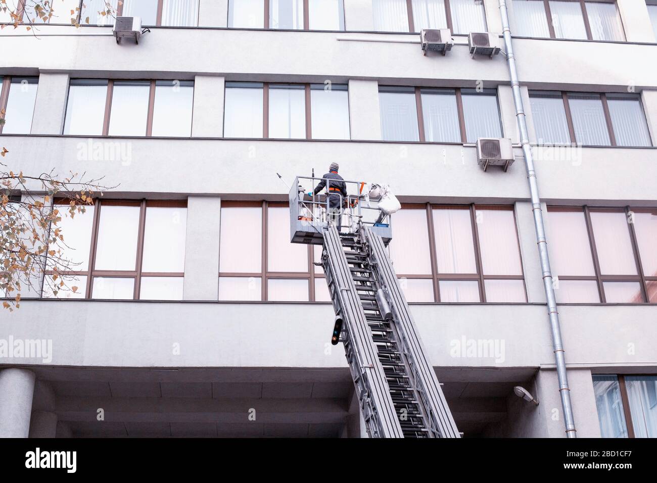 Girl climbing window hi-res stock photography and images - Alamy