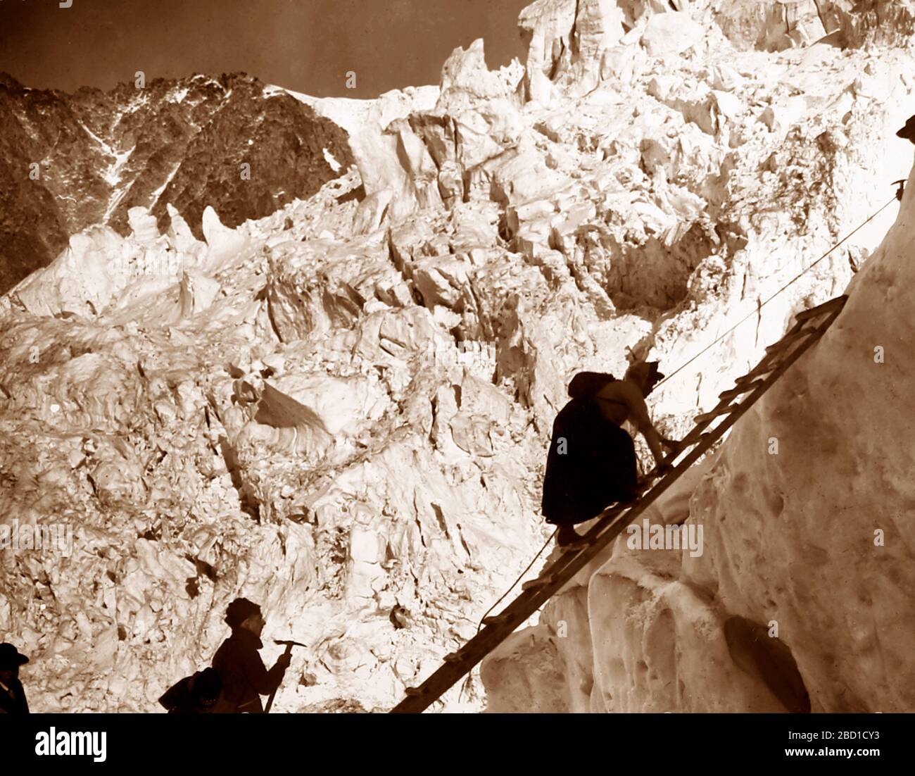 Lady climber crossing a crevasse in the Alps, Victorian period Stock ...