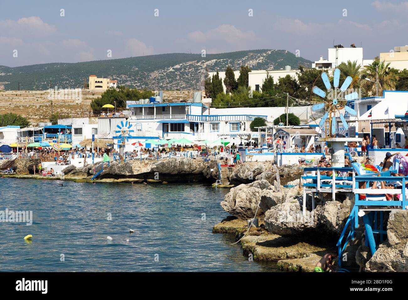 Chekka, Lebanon - June 4, 2017: Several tourists relaxing at the beach ...