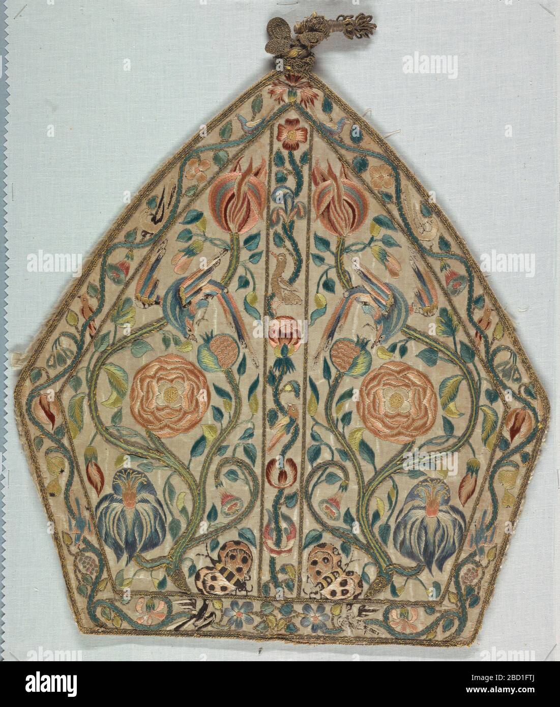 Mitre. Research in ProgressFront and back from a mitre; white satin ...