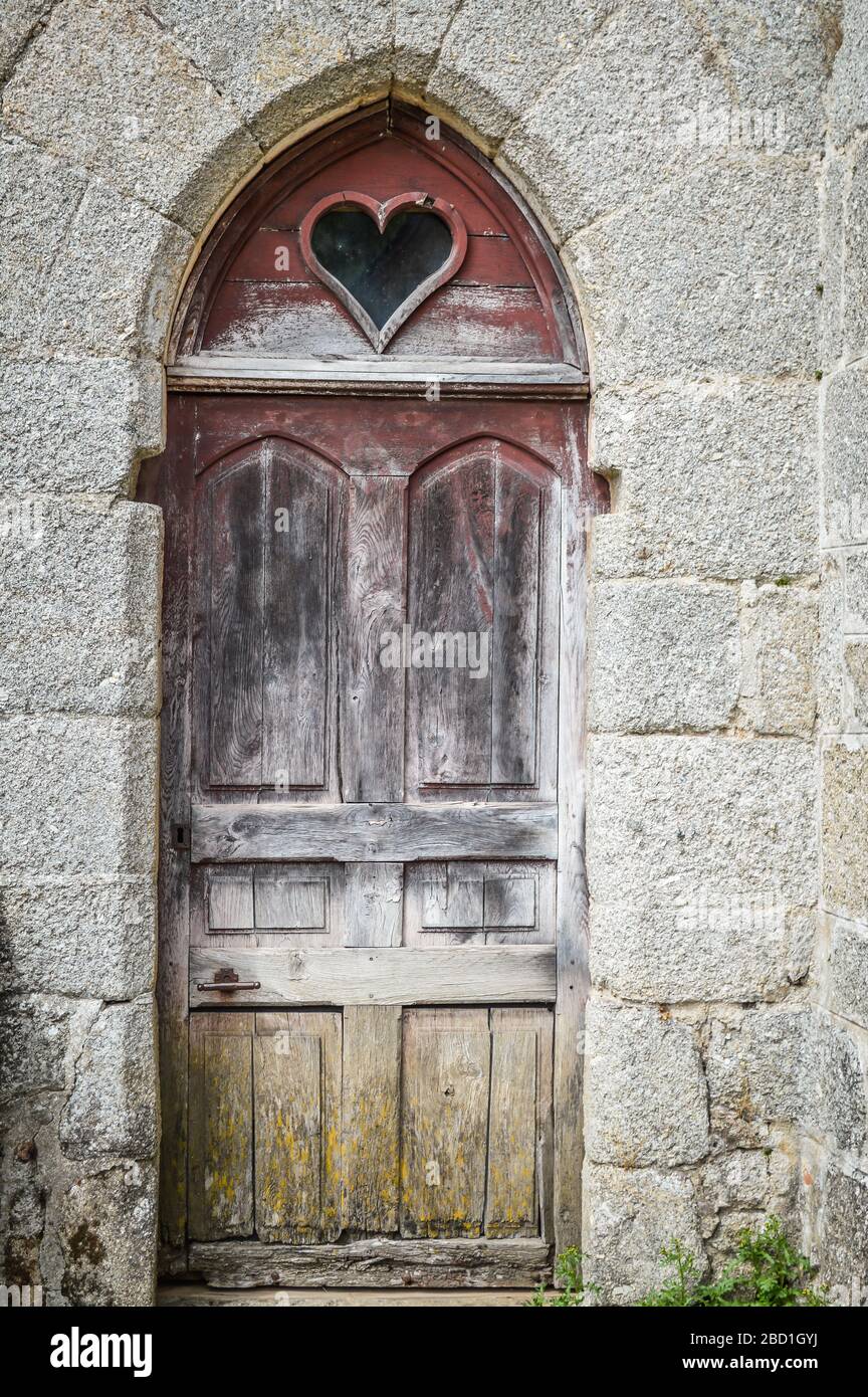 Ancient wood door at the fortified monastery of Saint-Michel des Anges ...
