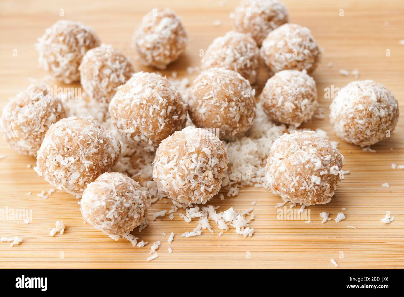 Homemade handmade sweet candy balls in coconut shavings. Healthy eating ...
