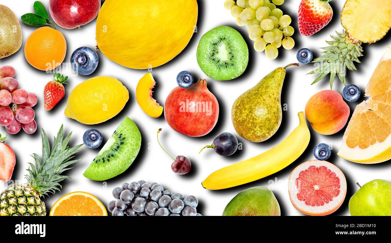 Creative photo of many different exotic tropical bright fruits with ...