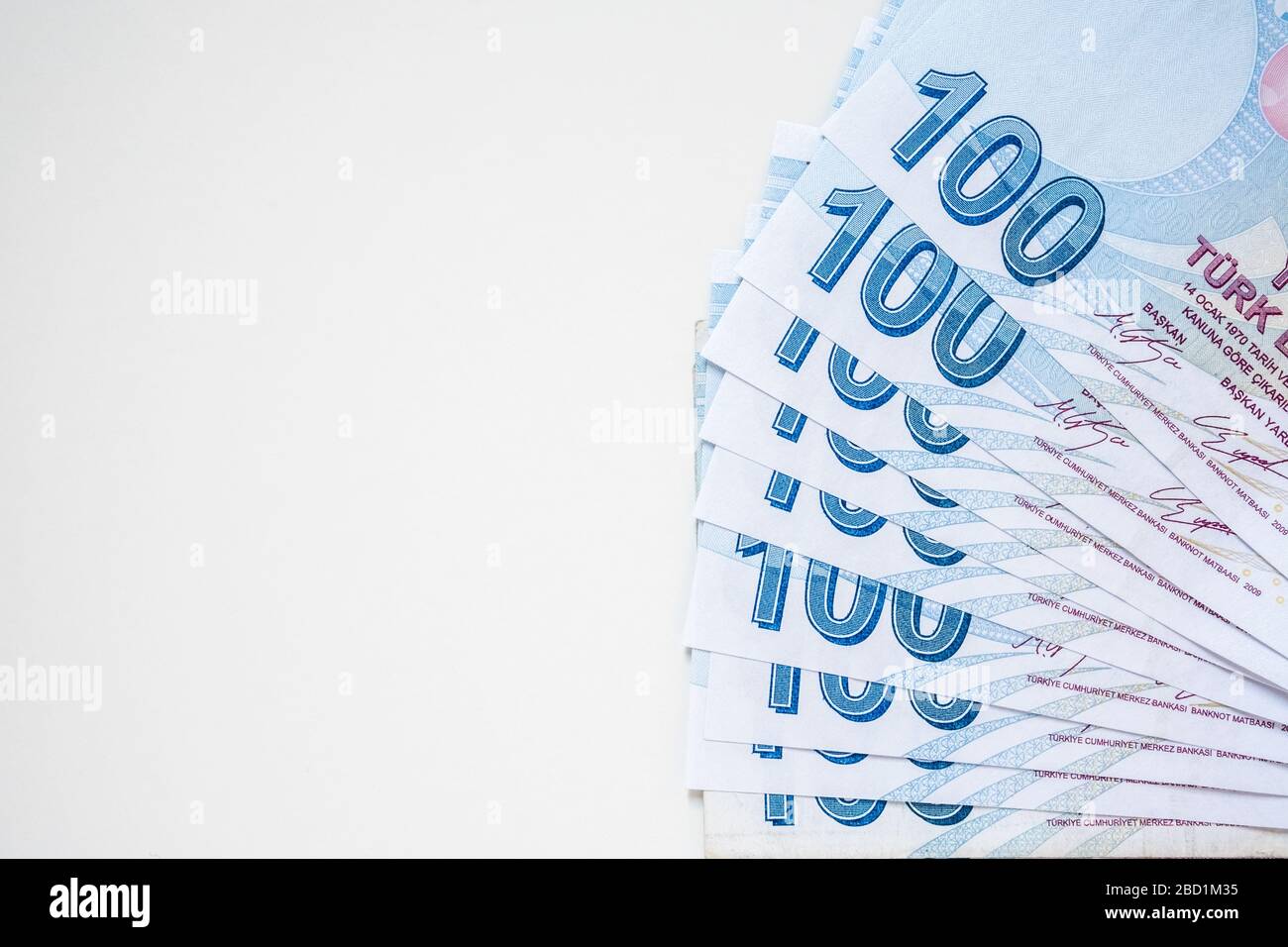 Bunch of 100 Turkish Lira (TRY) banknotes isolated on white background ...