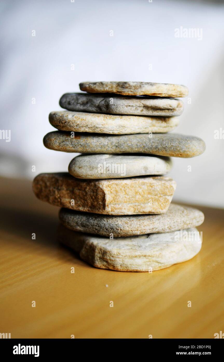 The flat light stones built in tower Stock Photo - Alamy
