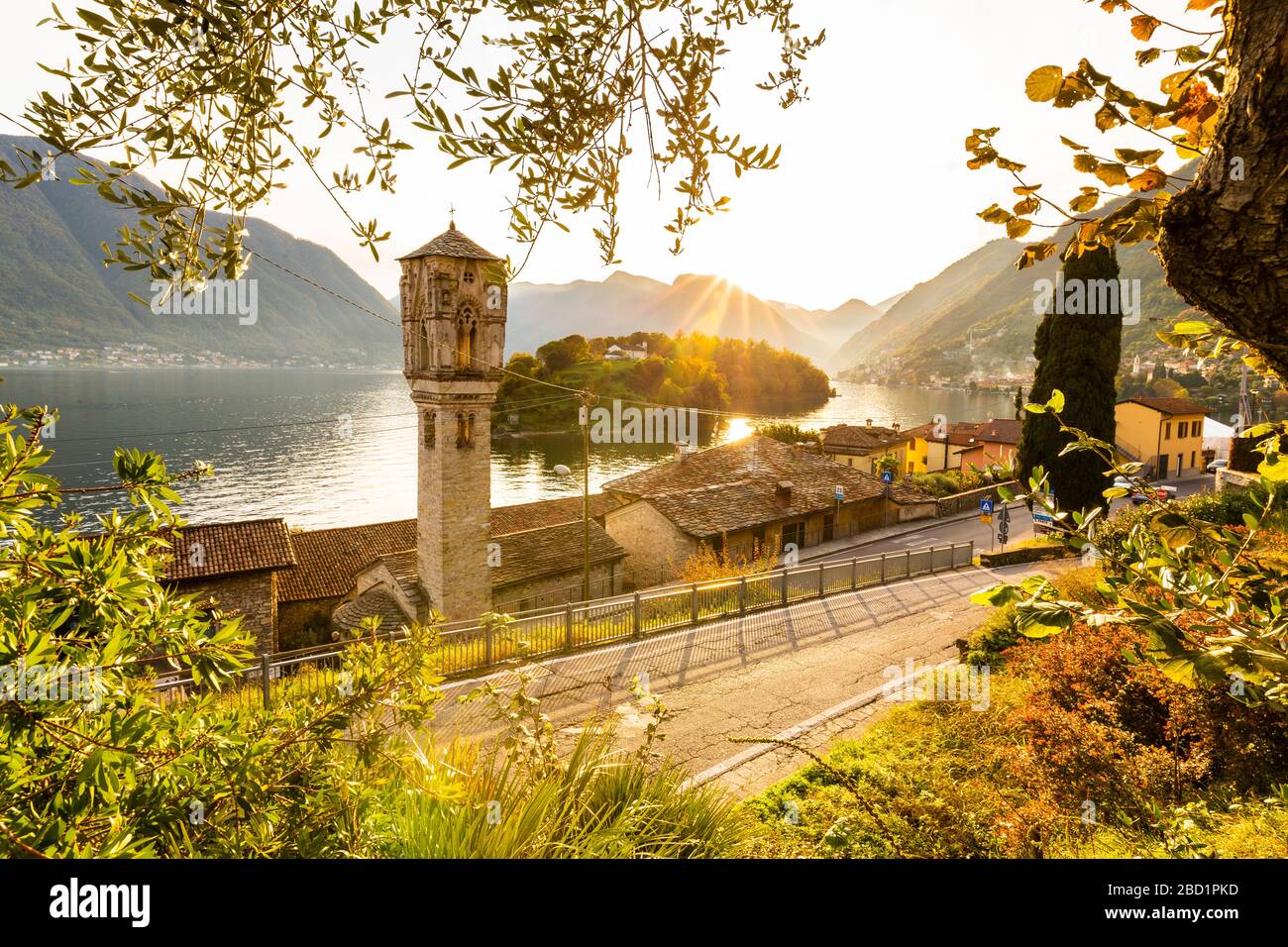 Traditional bell tower of Ossuccio with view of the Comacina Island and ...