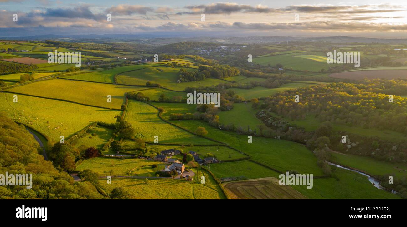 Aerial view by drone of rolling countryside near Lifton, Devon, England ...