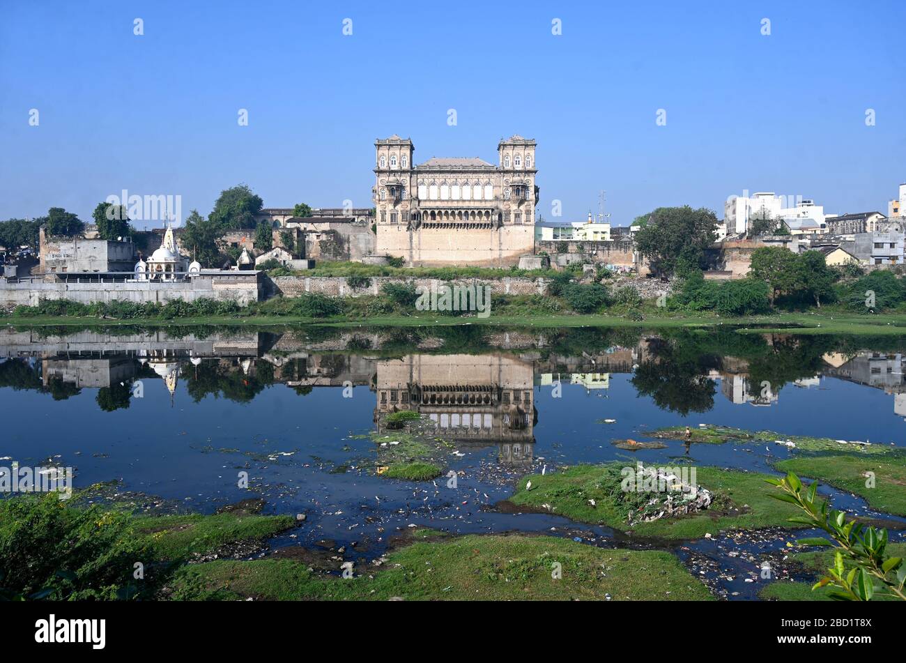 The 18th century Naulakha Palace facade reflected in the still waters ...