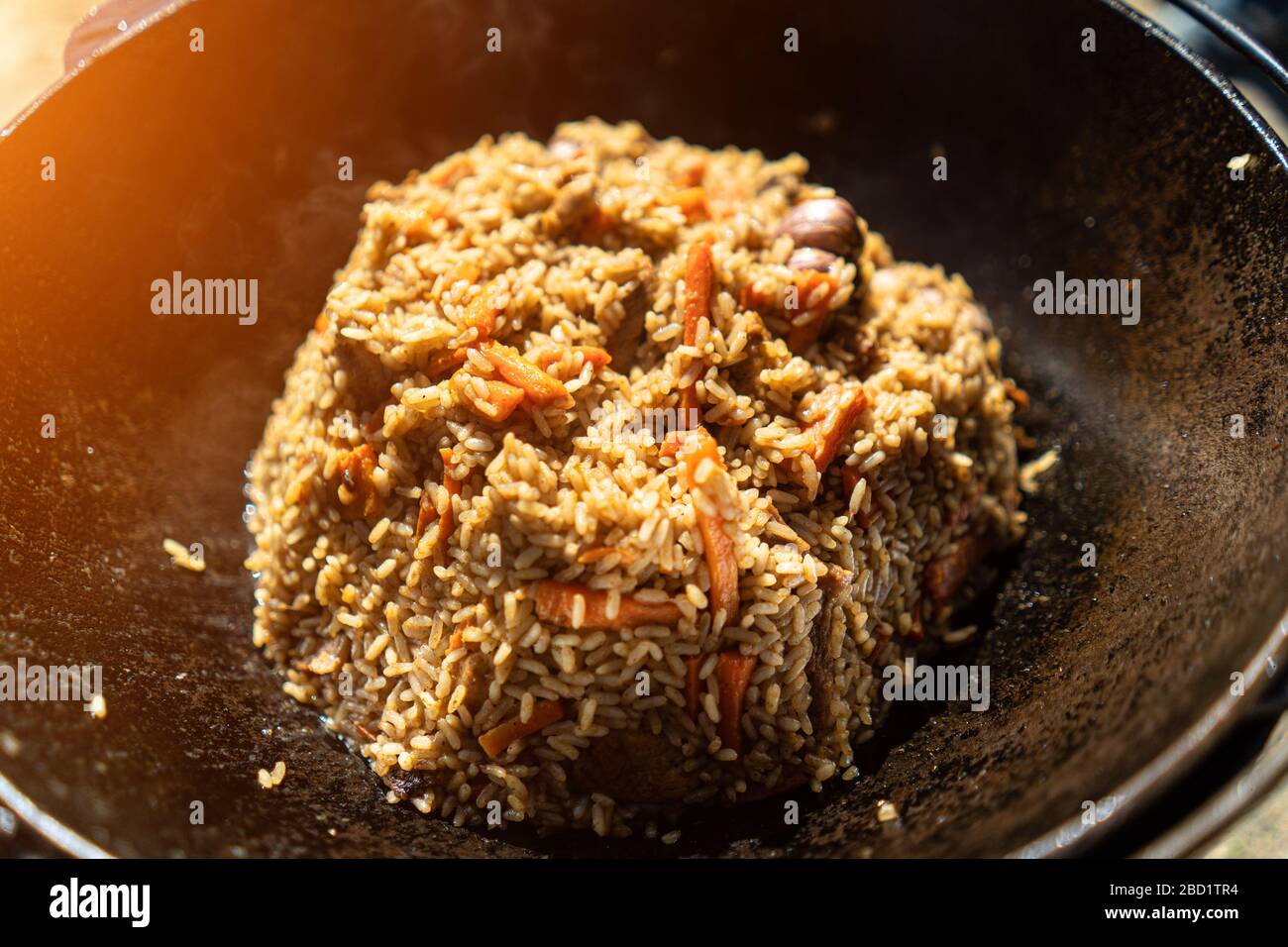 pilaf in a cauldron in close-up Stock Photo - Alamy