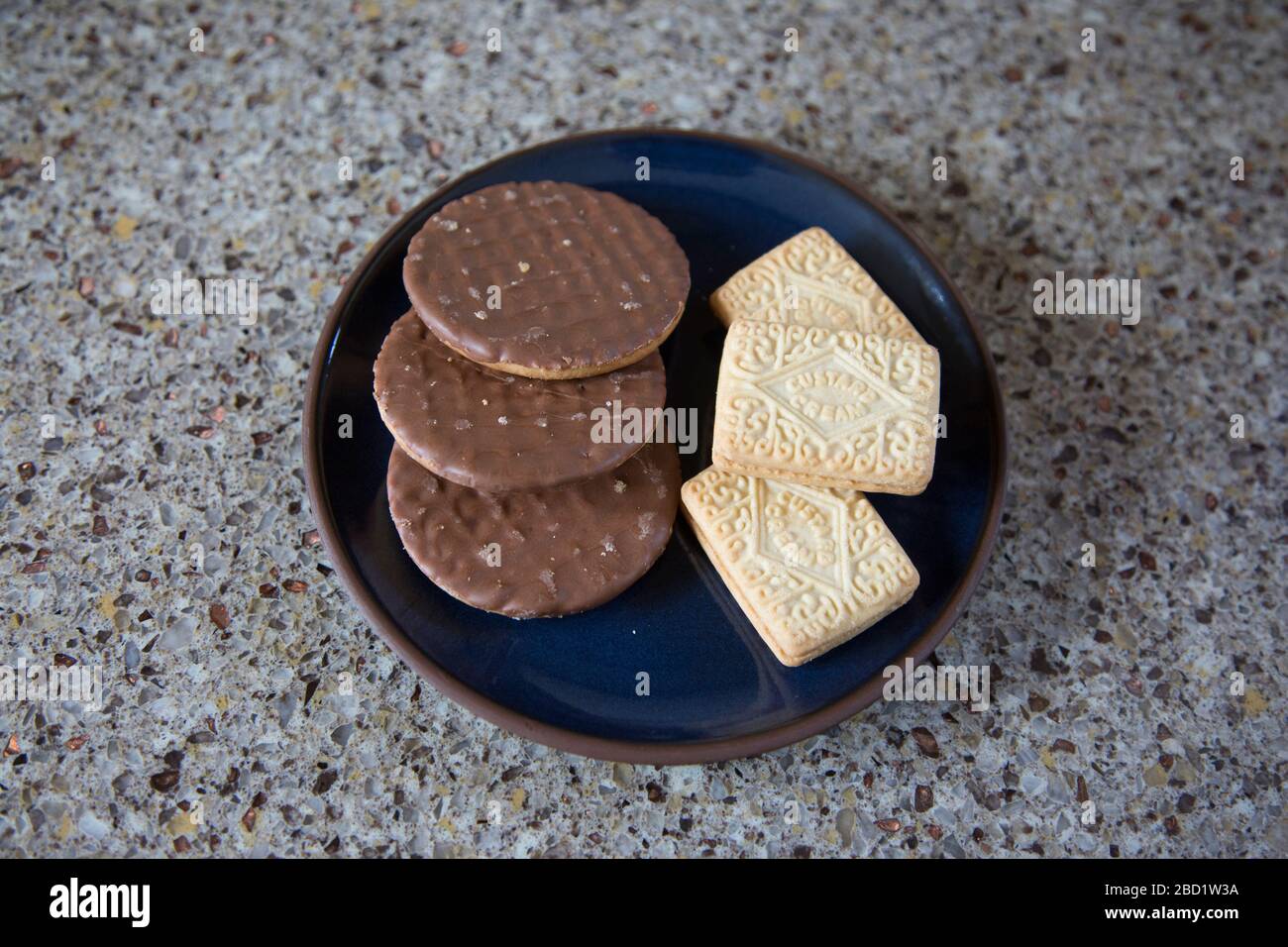 plate of biscuits, mixed biscuits sitting on a plate Stock Photo - Alamy