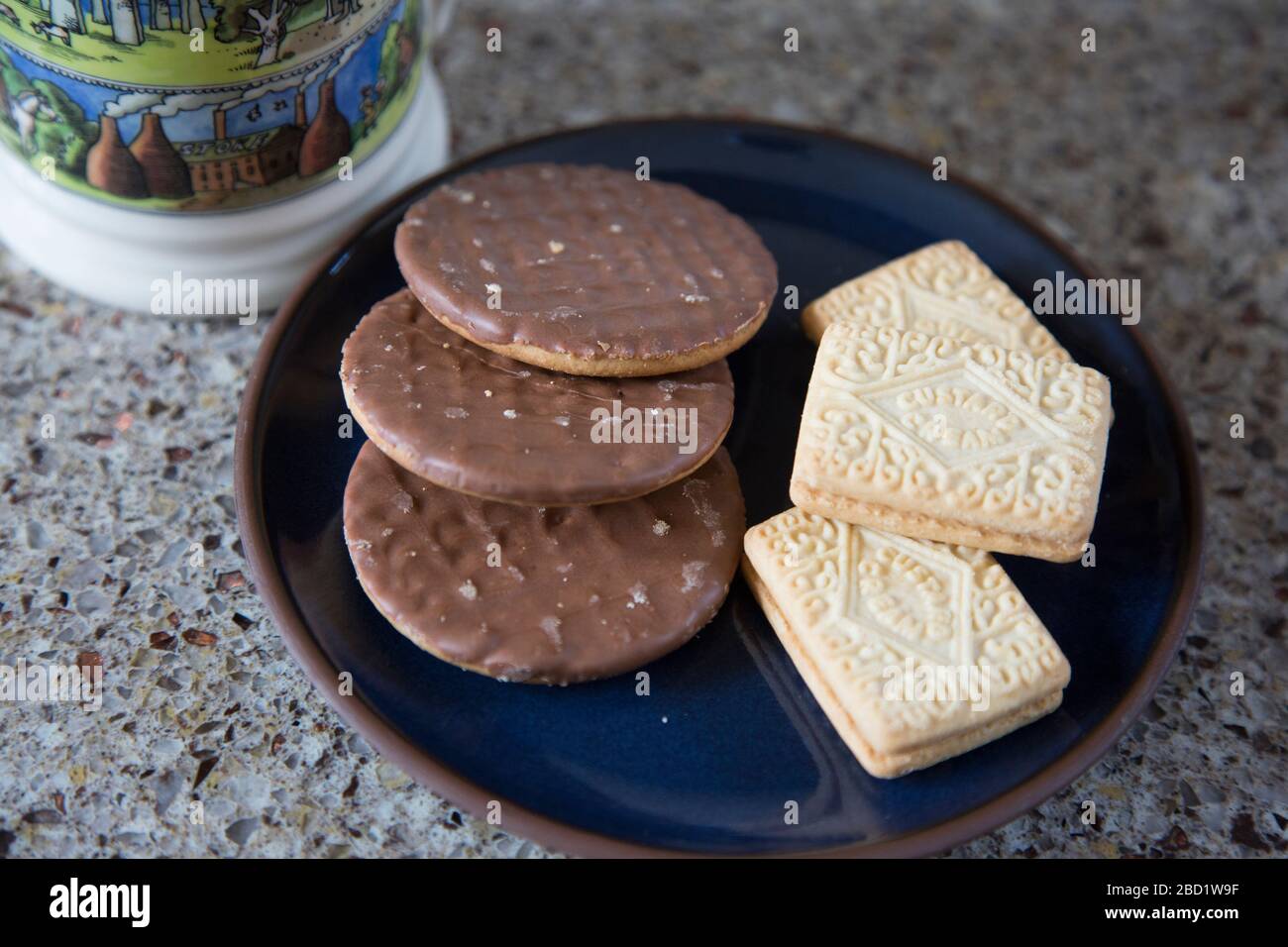 plate of biscuits, mixed biscuits sitting on a plate Stock Photo - Alamy