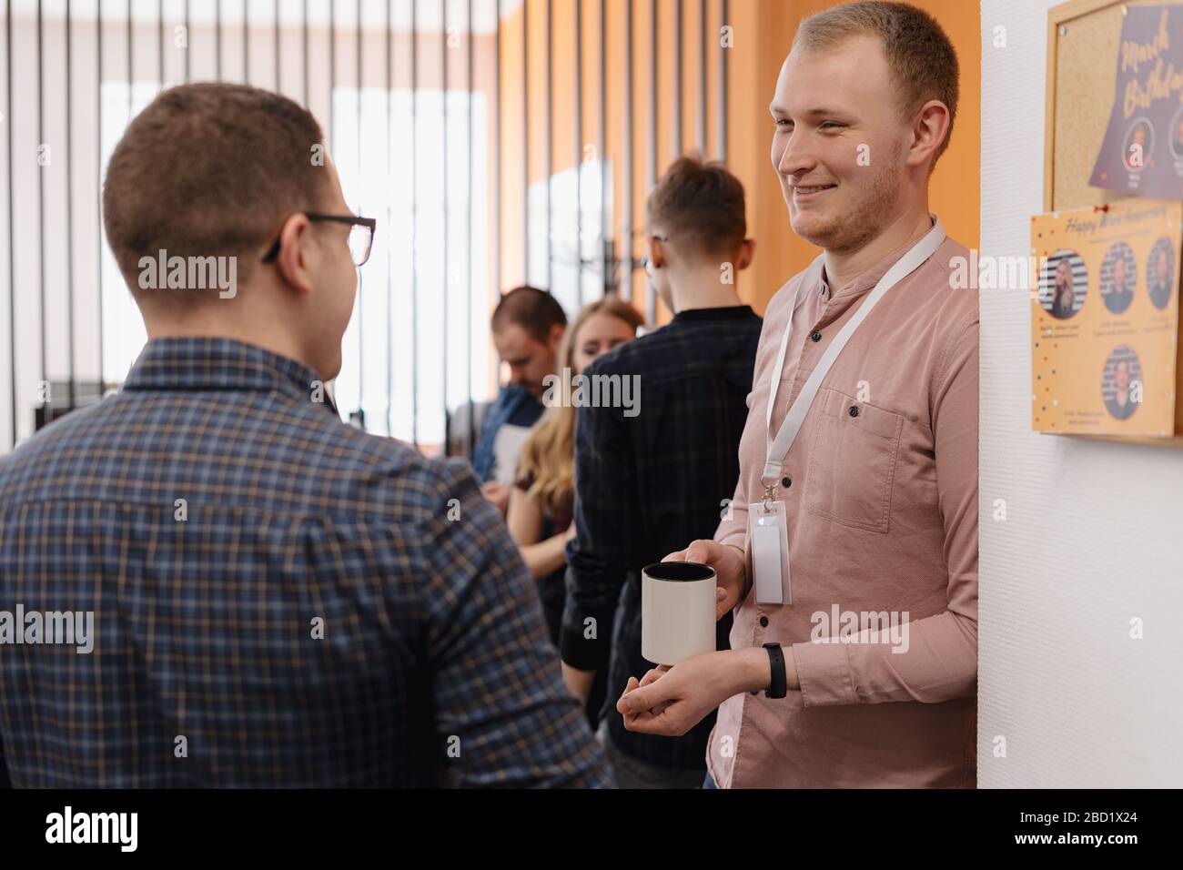 Happy diverse colleagues have fun at lunch break in office, smiling ...