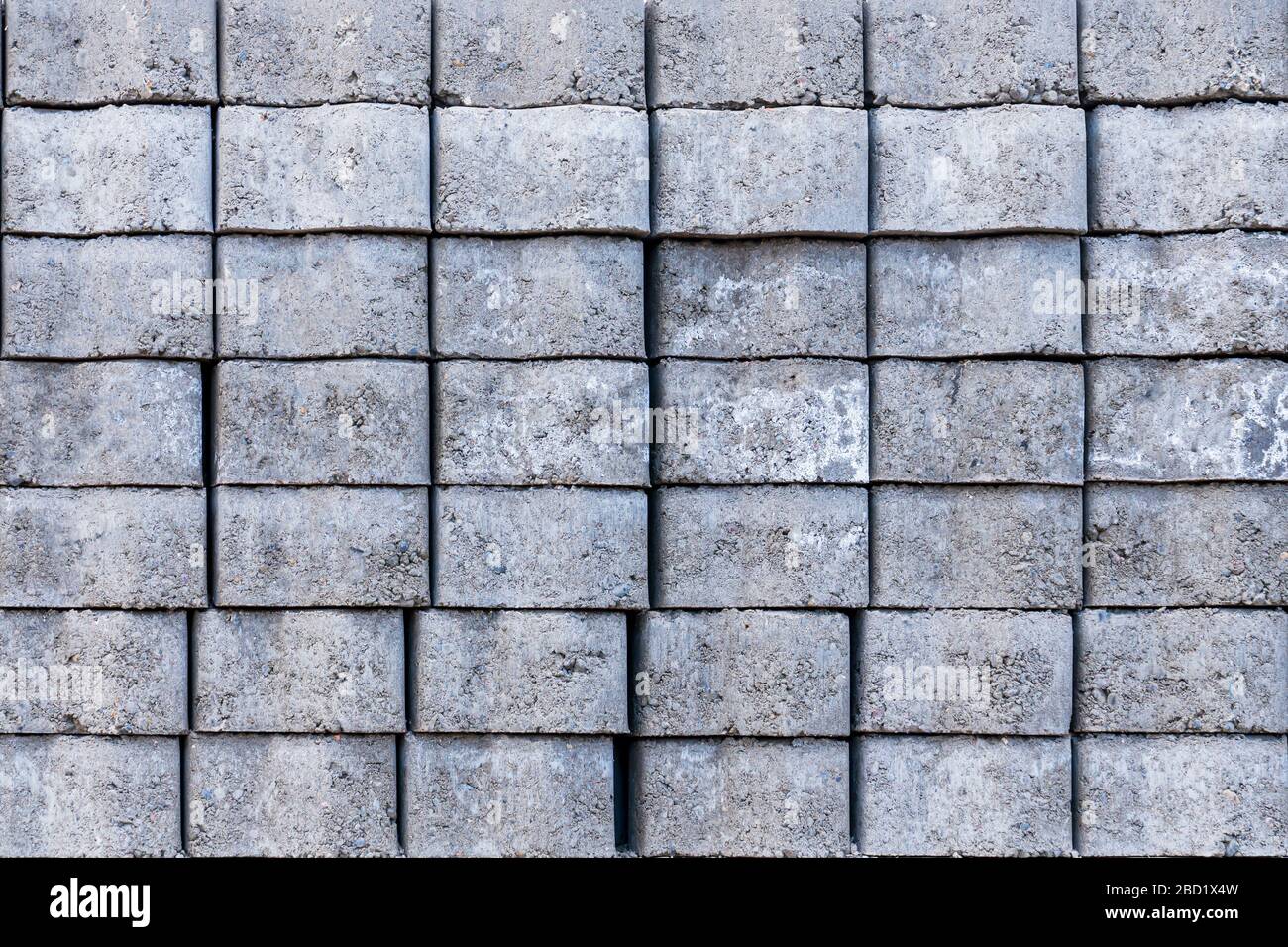 grey background, bricks laid on a pallet Stock Photo - Alamy