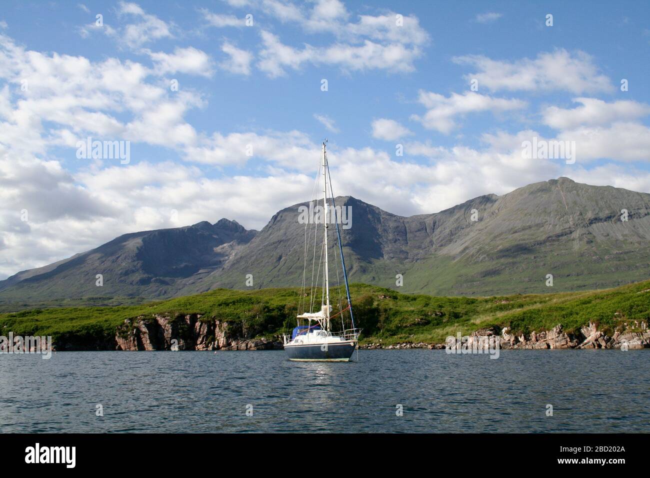 Sailing yacht anchored in Soay harbour, Soay, Isle of Skye, Hebrides ...
