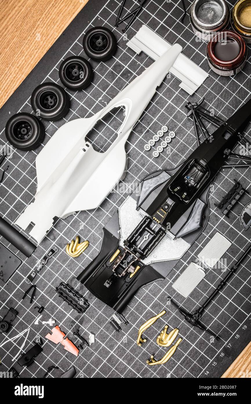 Toy Model Car Parts On A Desk Stock Photo - Alamy