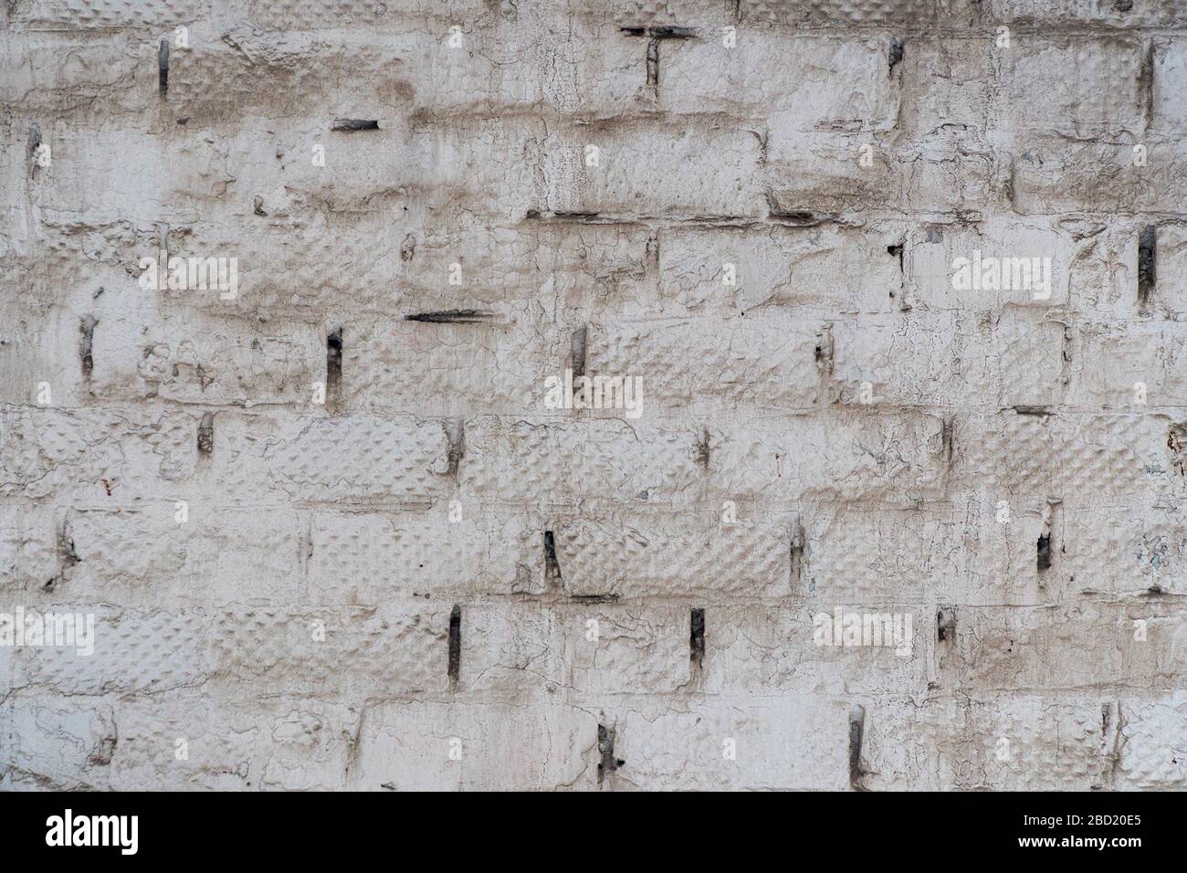 The texture of the White and grey dirty brick wall for background and ...