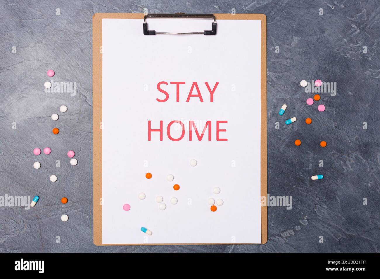Protection Concept. Top view of words stay at home with medicine ...