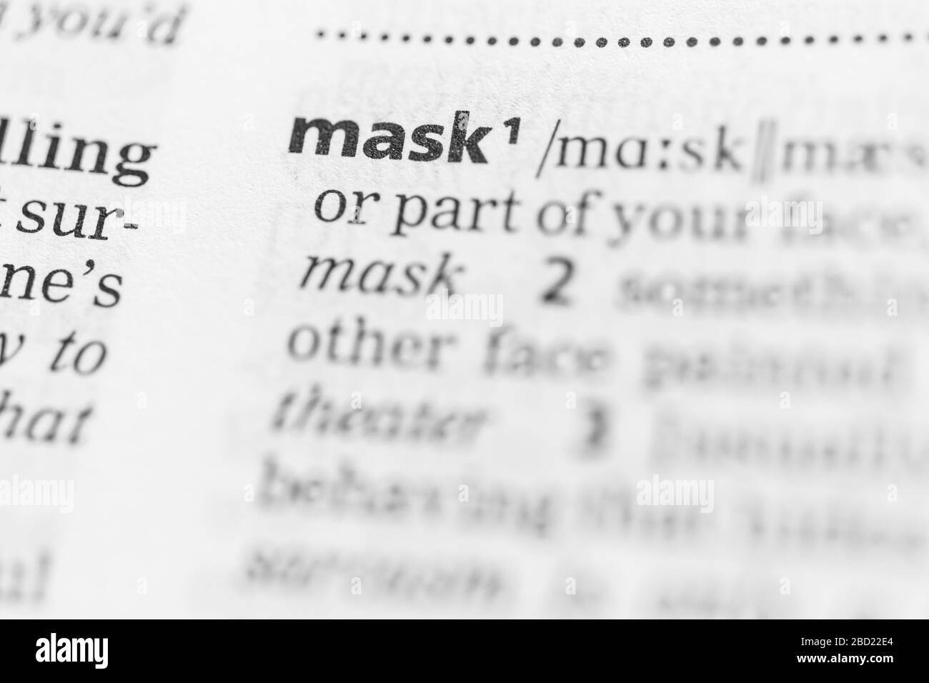 Word phrase mask look up in dictionary Stock Photo - Alamy