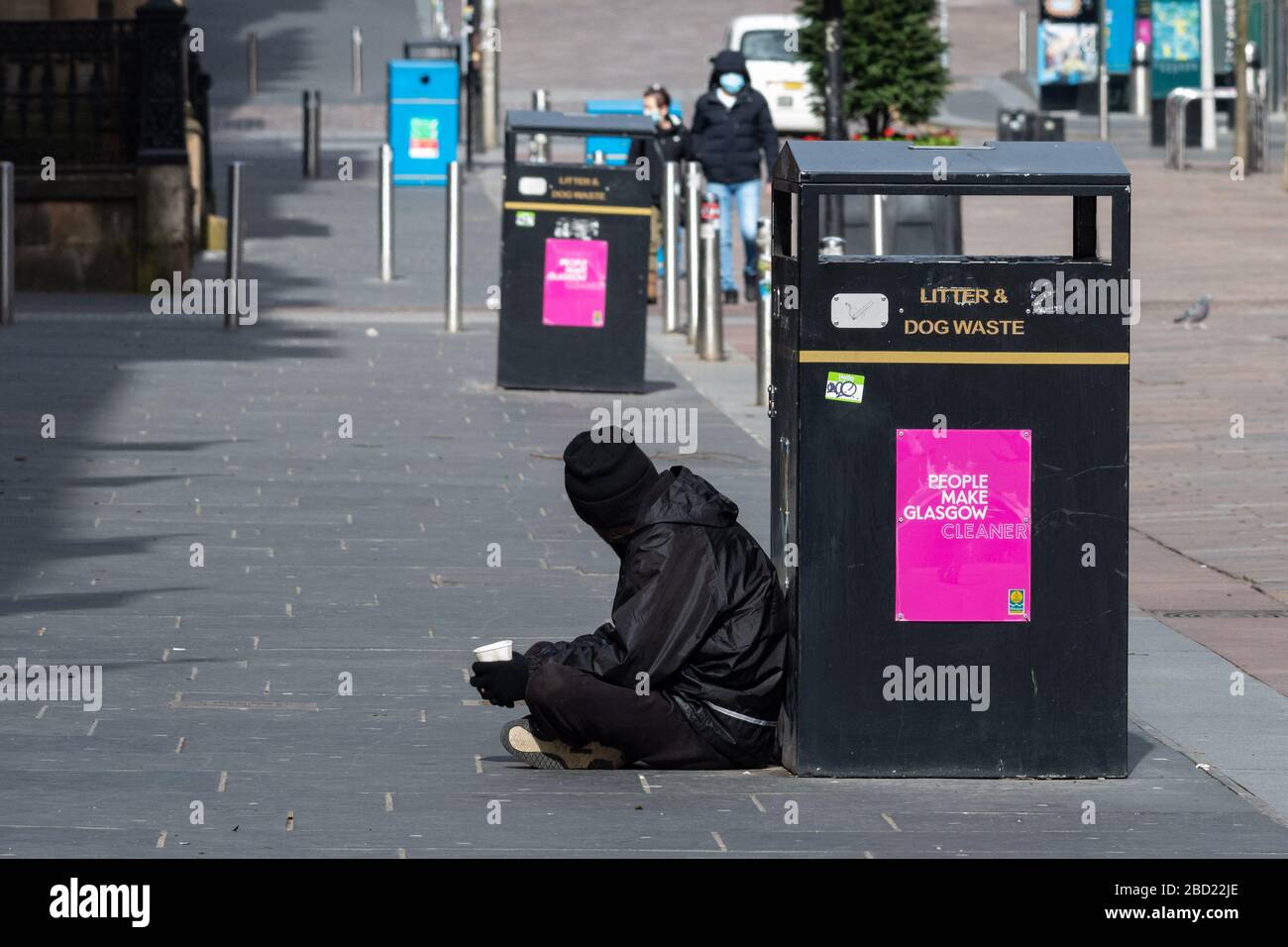 A man (possibly homeless) begging on the almost deserted Buchanan ...