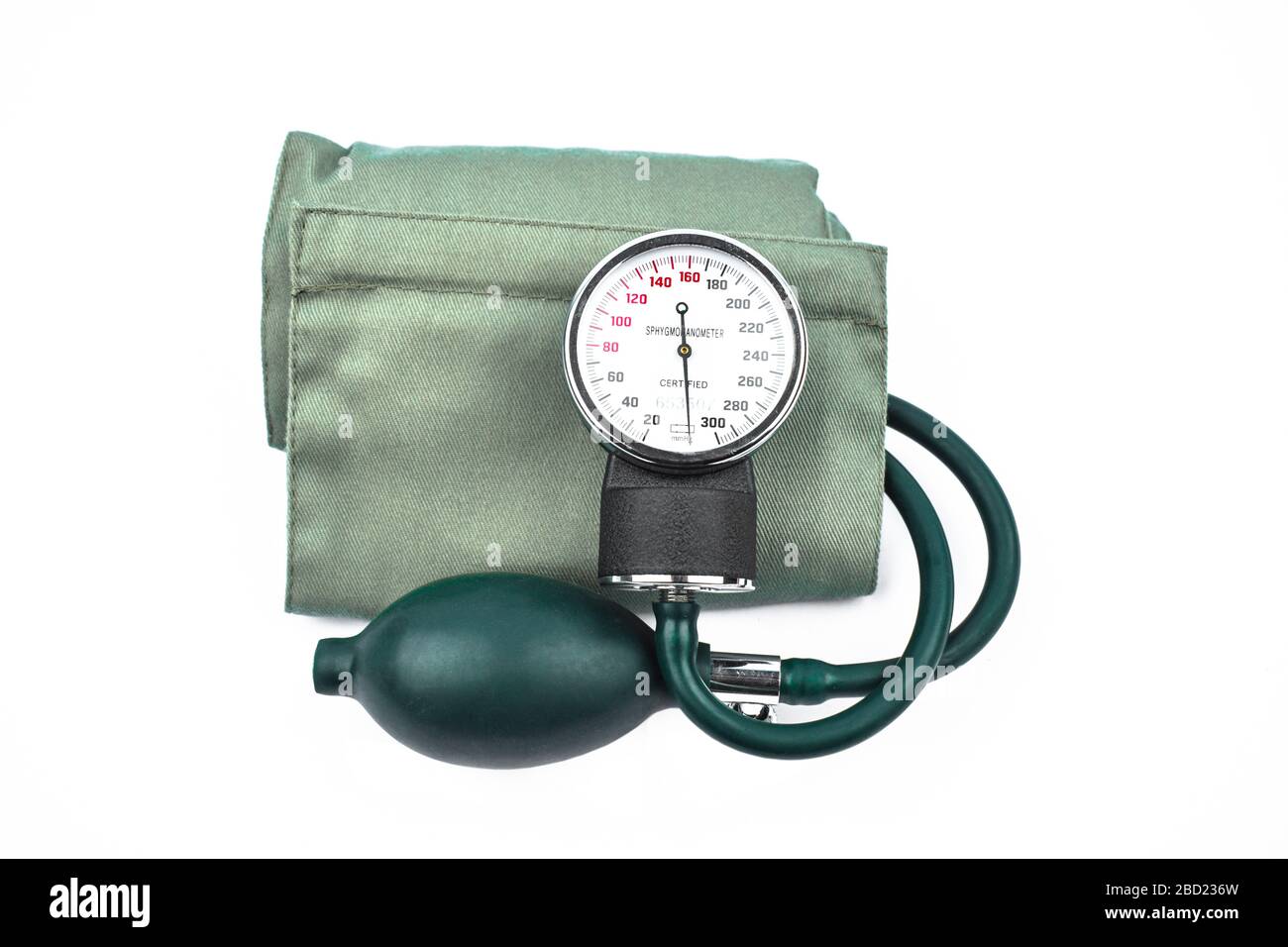 Blood pressure measuring machine gently placed over an isolated white ...