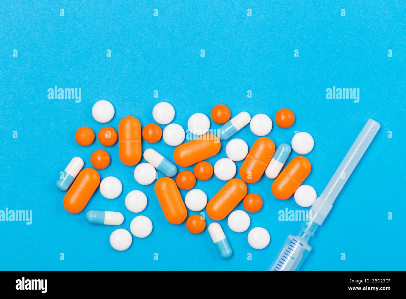 Close up of Assorted pharmaceutical medicine pills, tablets and syringe ...