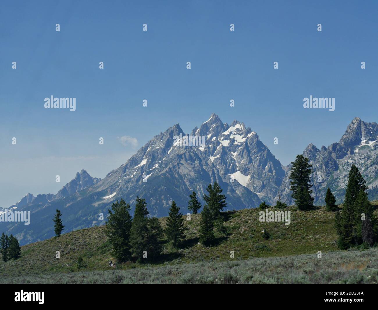 Distant peaks of the mountain ranges at the Grand Teton National Park ...