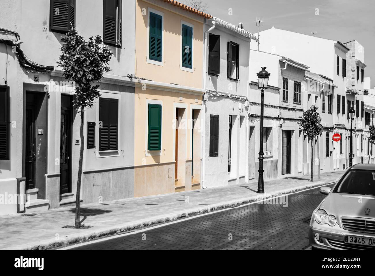 A colour pop image of a street in Mahón Stock Photo - Alamy