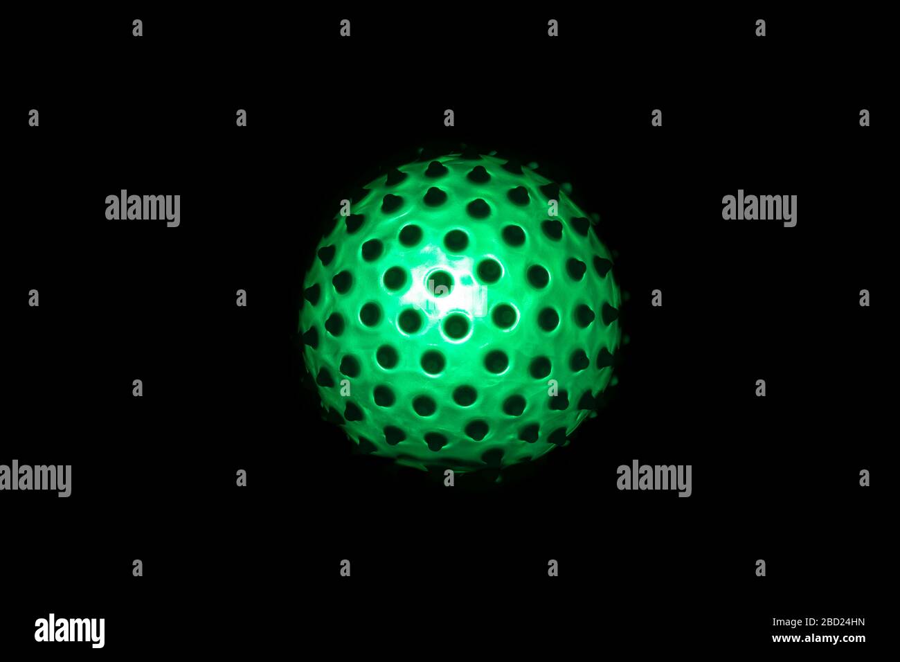 representation of a virus using an illuminated sphere with a black ...