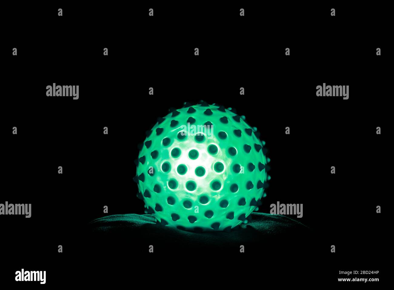 representation of a virus using an illuminated sphere with a black ...