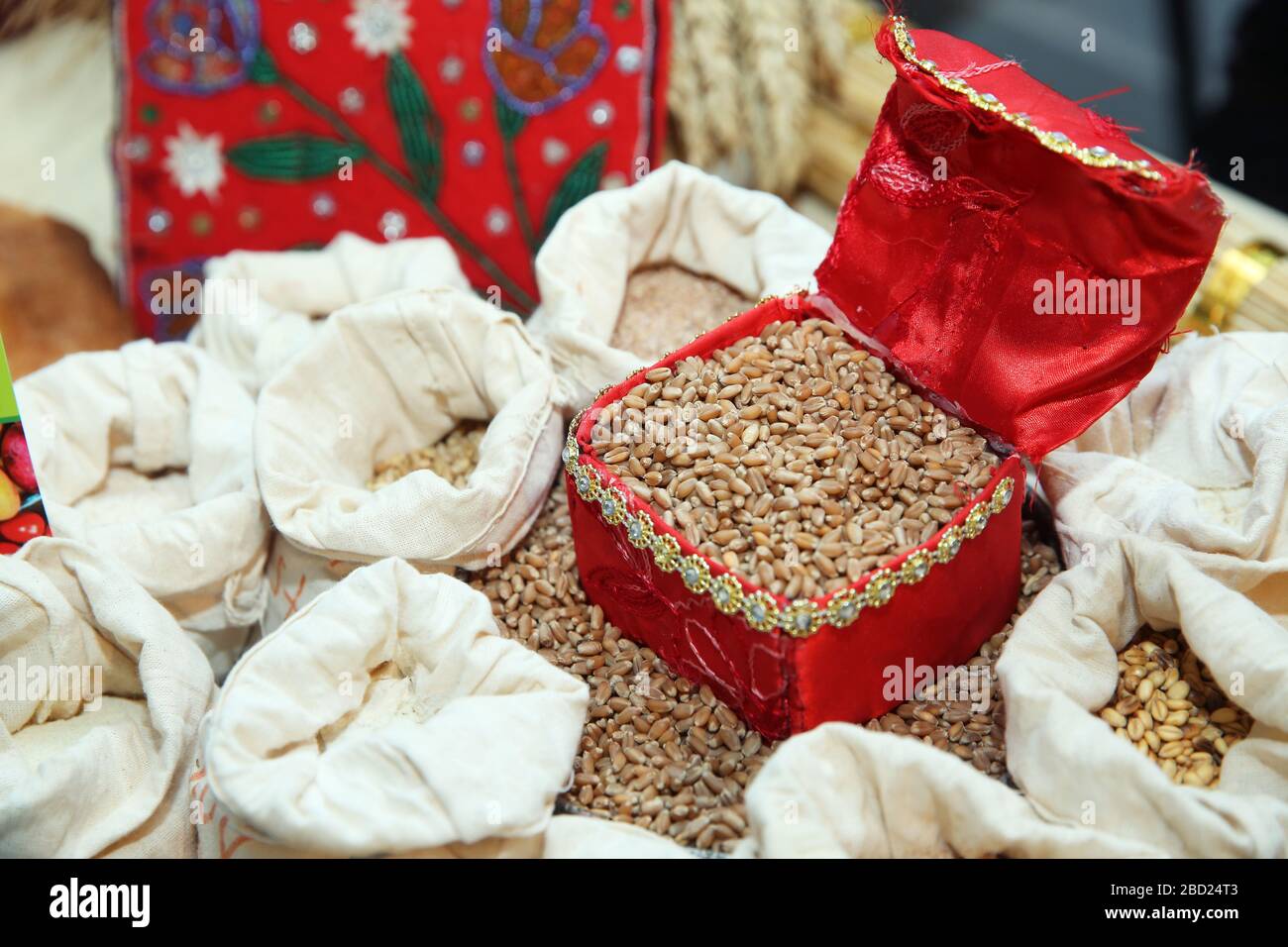 Wheat grain in a square box . wheat in a red box Stock Photo - Alamy