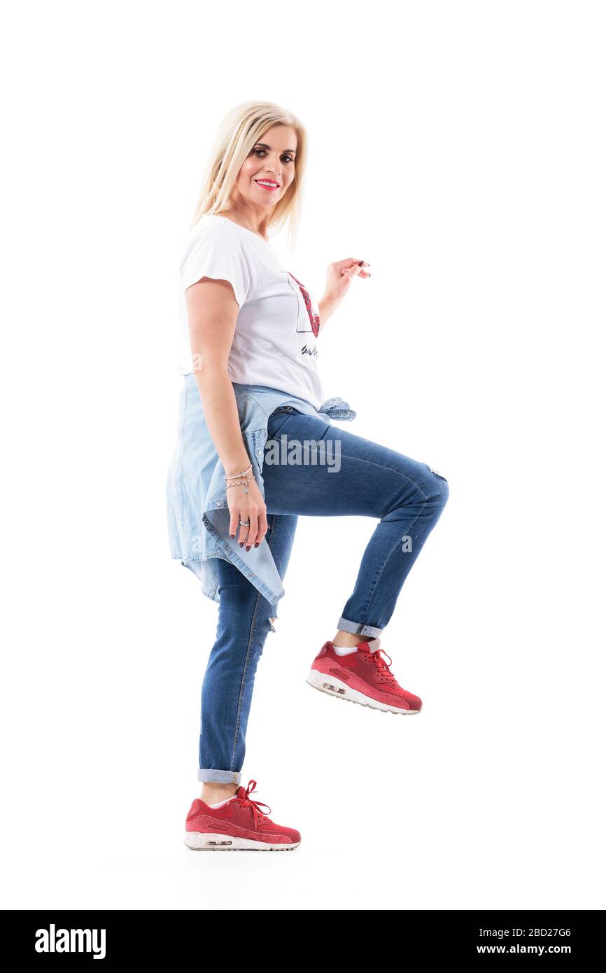 Woman climbing on ladder Cut Out Stock Images & Pictures - Alamy