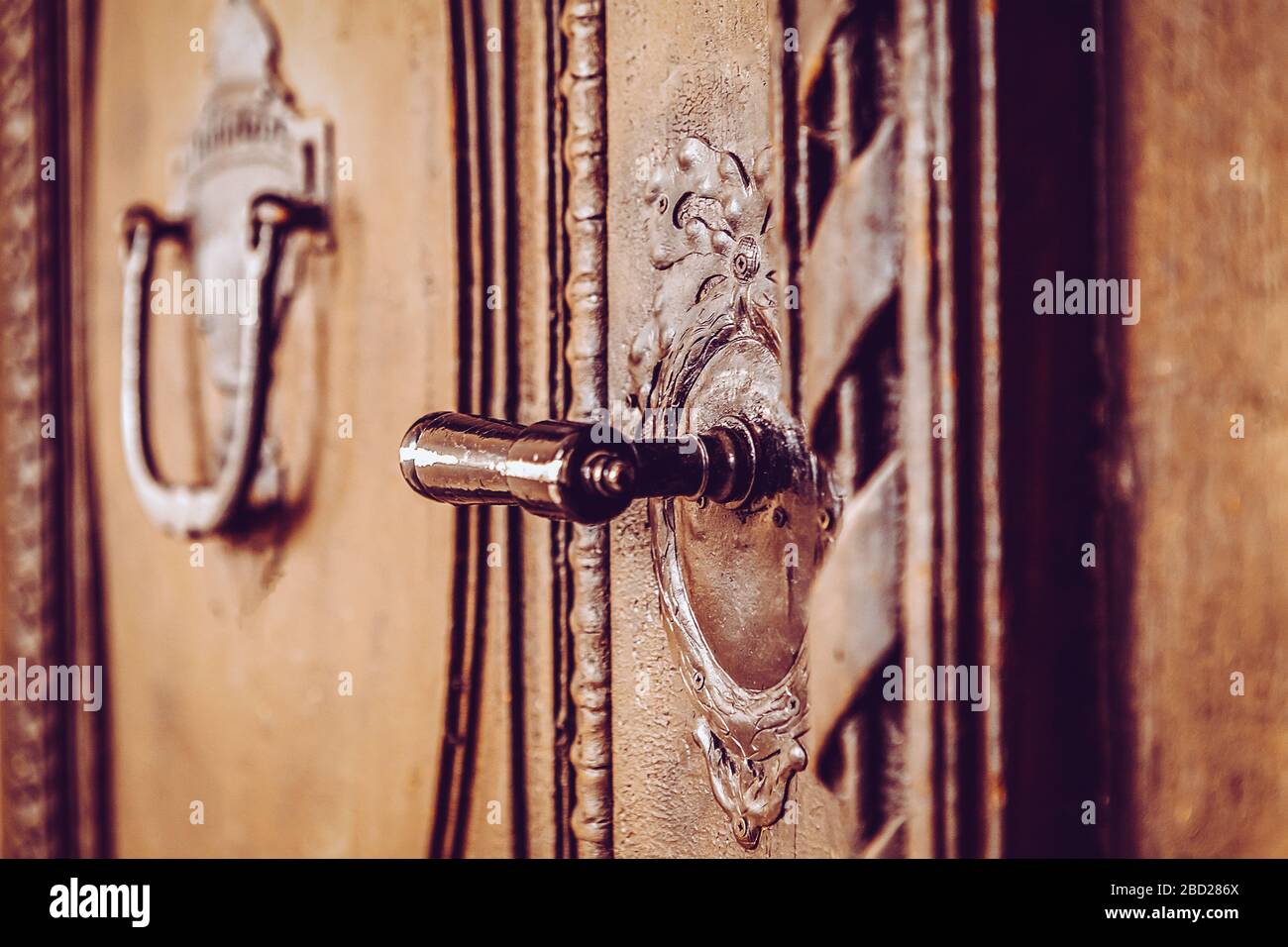 old wooden entrance door with antique door handle Stock Photo - Alamy
