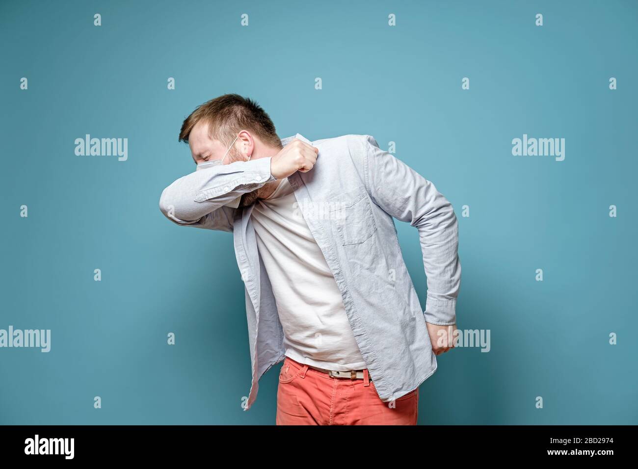 Cough and sneeze into elbow hi-res stock photography and images - Alamy